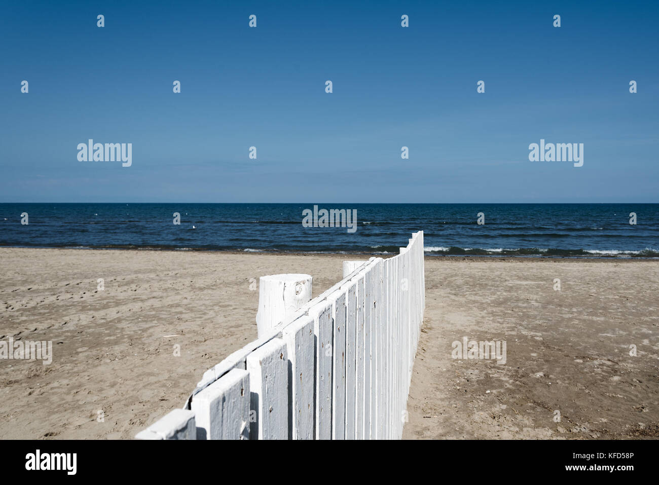 Fence on beach, Apulia, Italy Stock Photo - Alamy