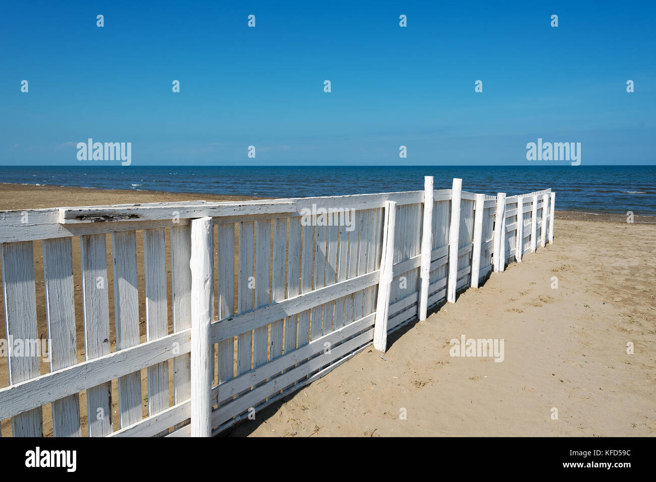 Fence on beach, Apulia, Italy Stock Photo - Alamy