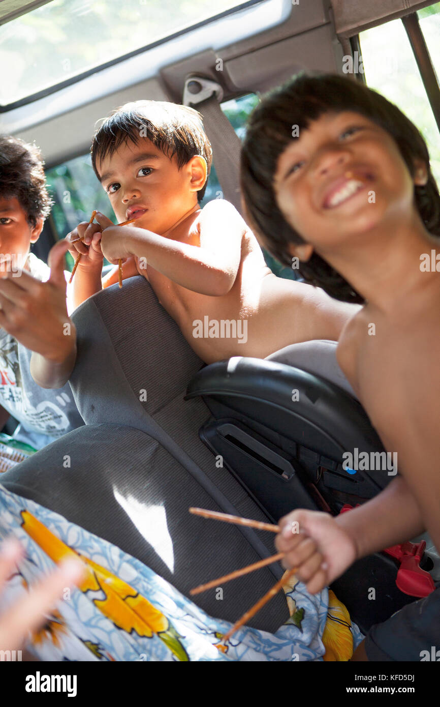 FRENCH POLYNESIA, Moorea Island. Kids in a car Stock Photo - Alamy