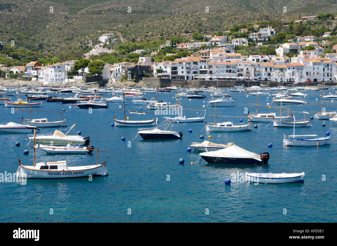 White ships at the shore ot the Mediterranean sea at Cadaques, a ...