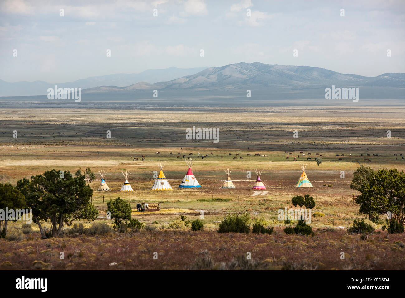 USA, Nevada, Wells, colorful tipis are scattered all over Mustang ...