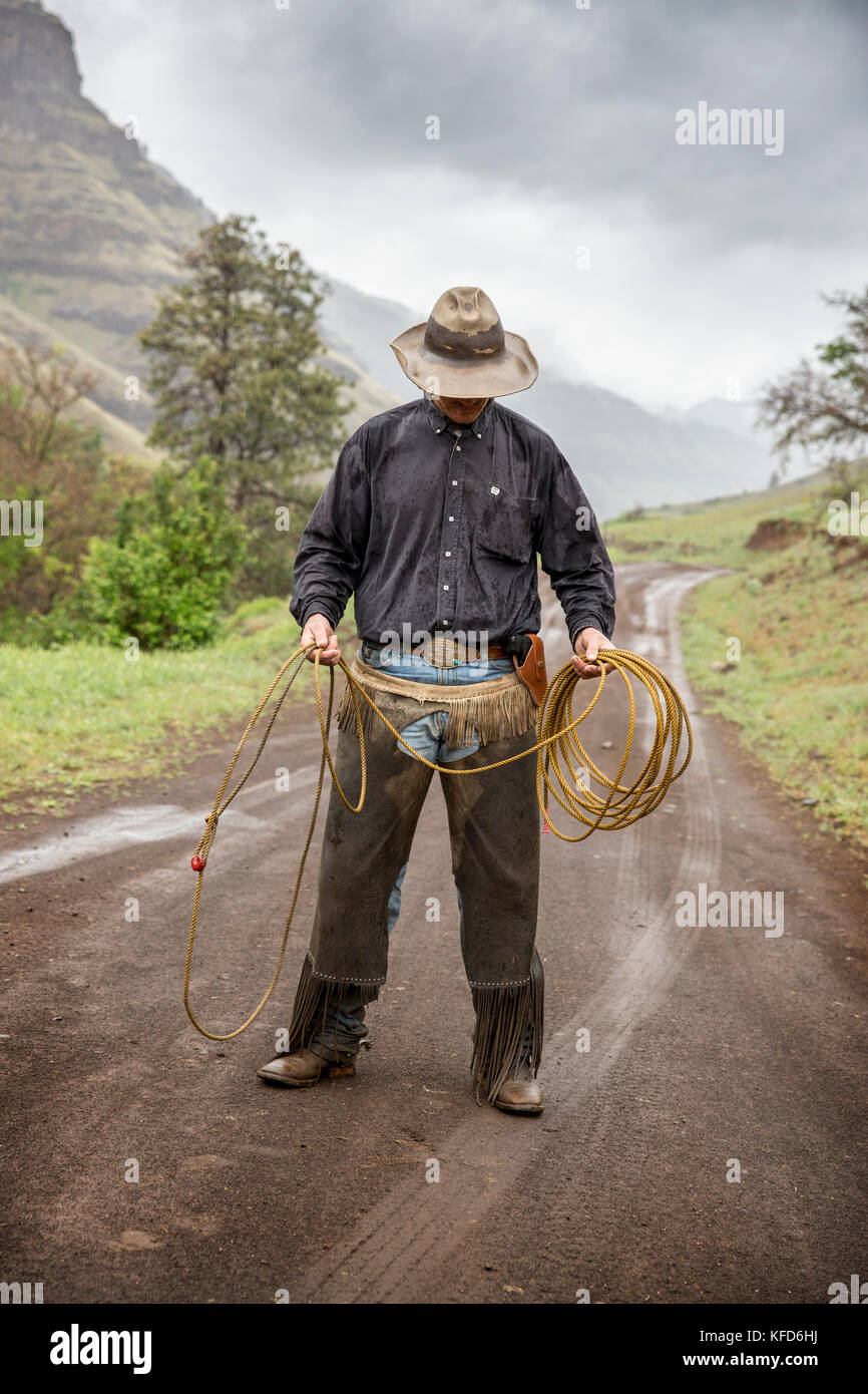 USA, Oregon, Joseph, portrait of cowboy Cody Ross in the canyon up Big ...