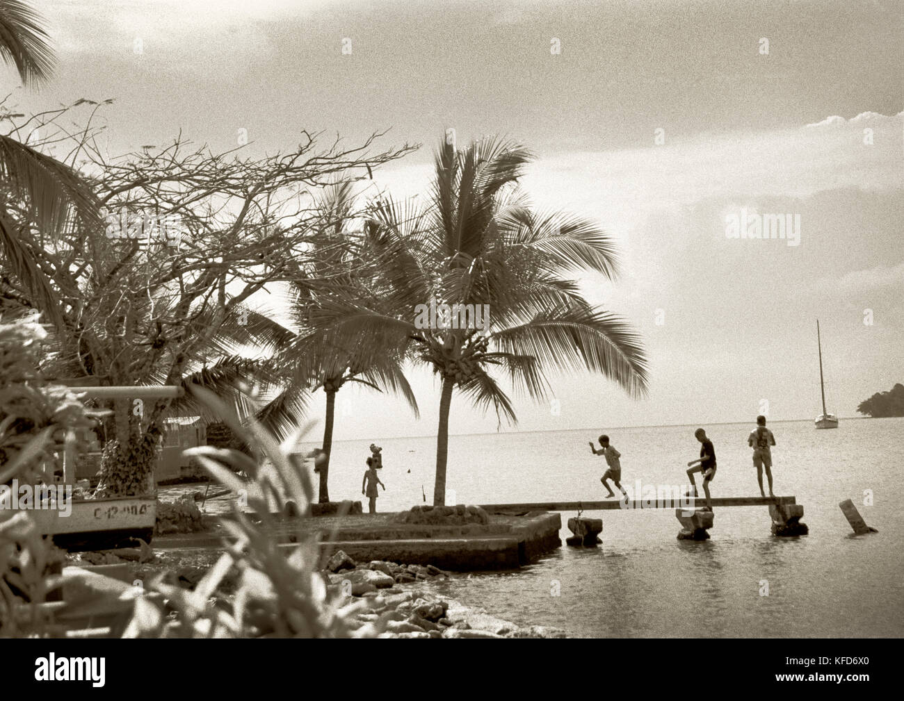 PANAMA, children playing on a pier, Portobello (B&W Stock Photo - Alamy