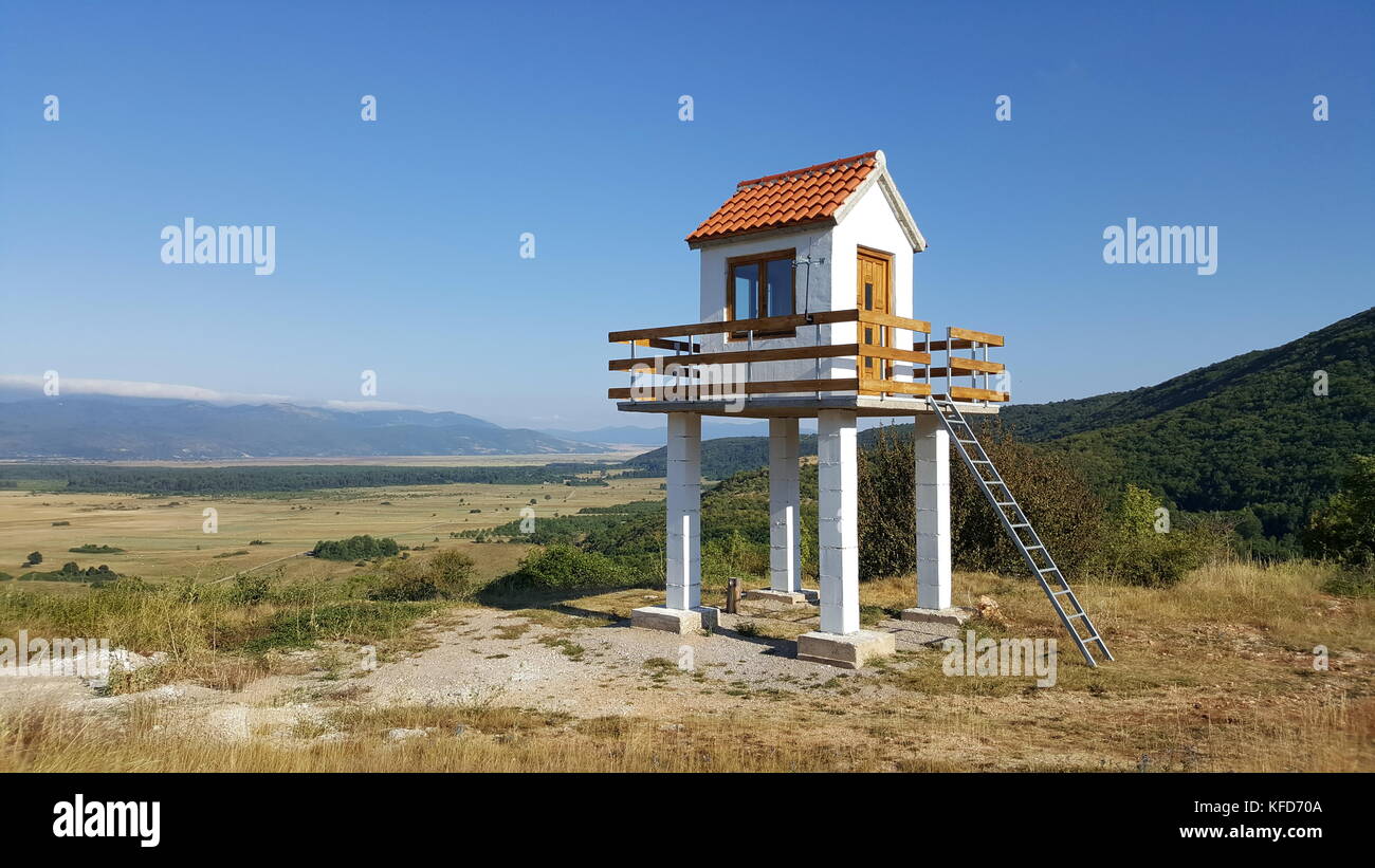 Completely renovated fire observation tower with wooden fence and metal ...