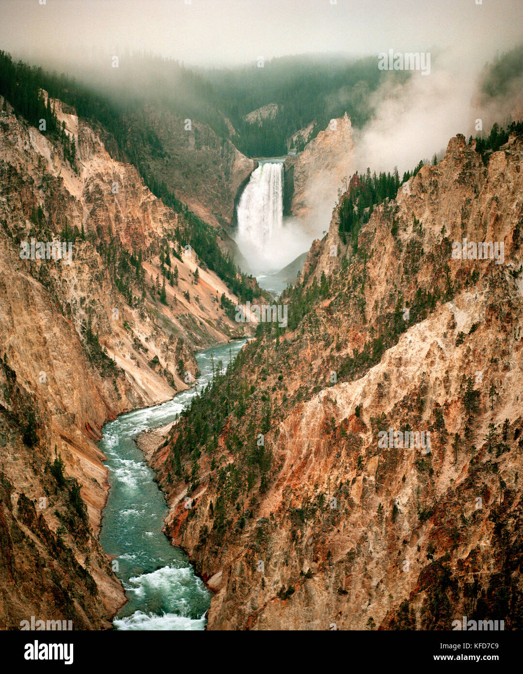 USA, Wyoming, Yellowstone Falls and River amid rocky mountains ...