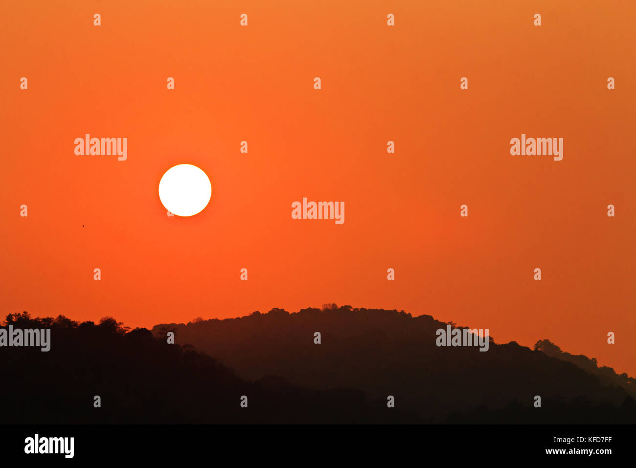 Nice sunset over Buddhist temple on mountain Stock Photo - Alamy