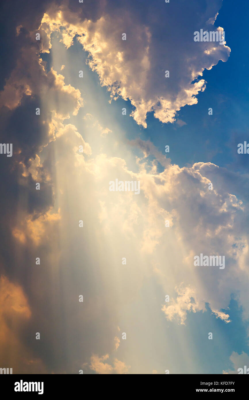 Clouds and sunbeam on blue sky background Stock Photo - Alamy