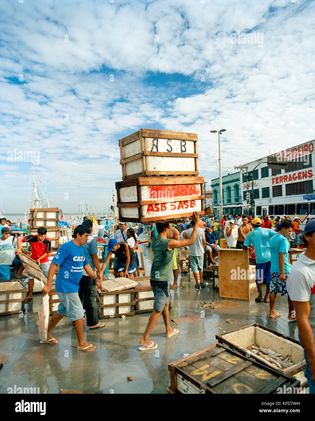 Brazil, Belem, South America, crowd of people at fish market while a ...