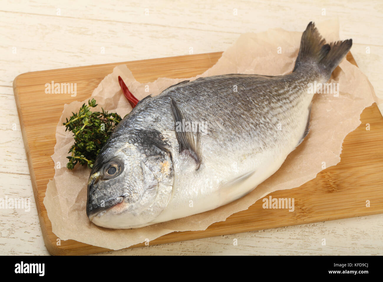 raw dorada fish - ready for cooking Stock Photo - Alamy