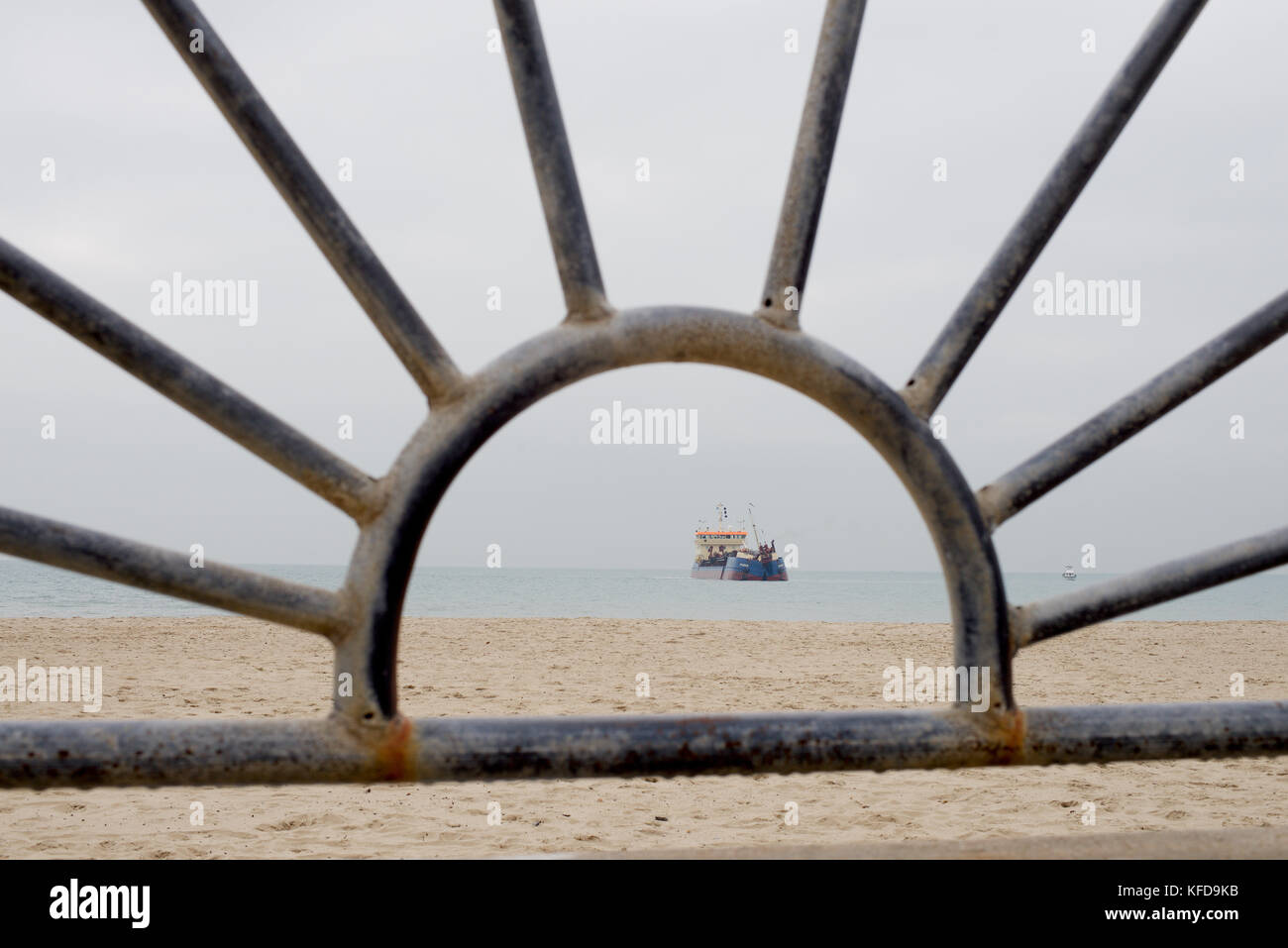 A ship unloading sand by splitting itself off the beach at Bournemouth ...