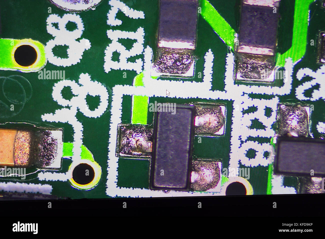 an electronic board seen throgh monitor of microscope Stock Photo - Alamy