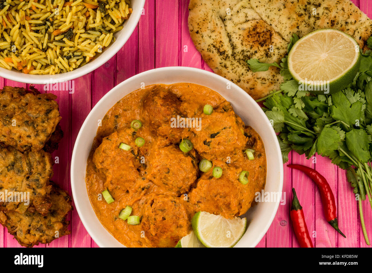 Indian Style Vegetable Kofta Curry Meal On A Pink Wooden Background ...