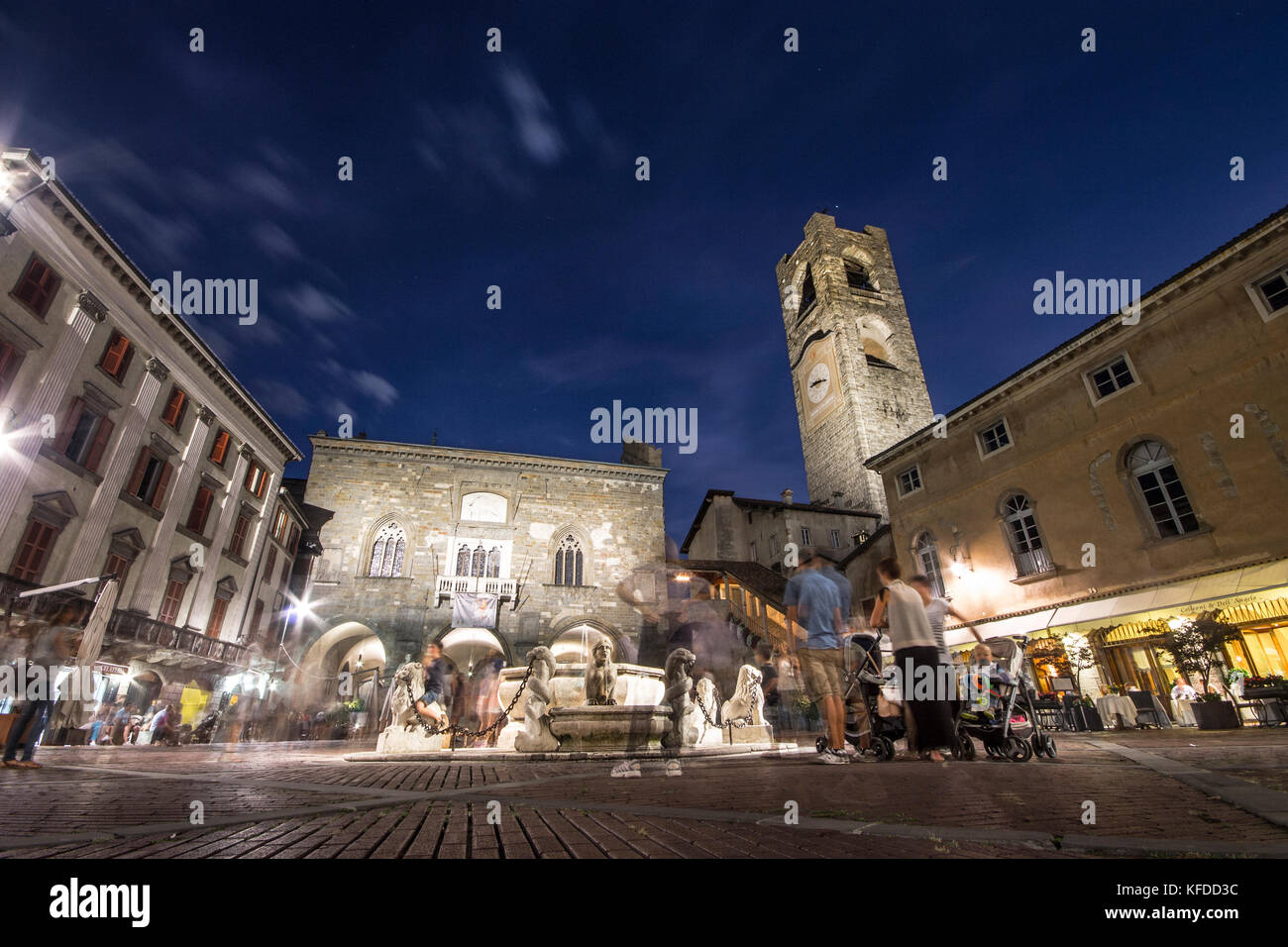 The Piazza Vecchia in Bergamo at night, with the Palazzo della Ragione ...