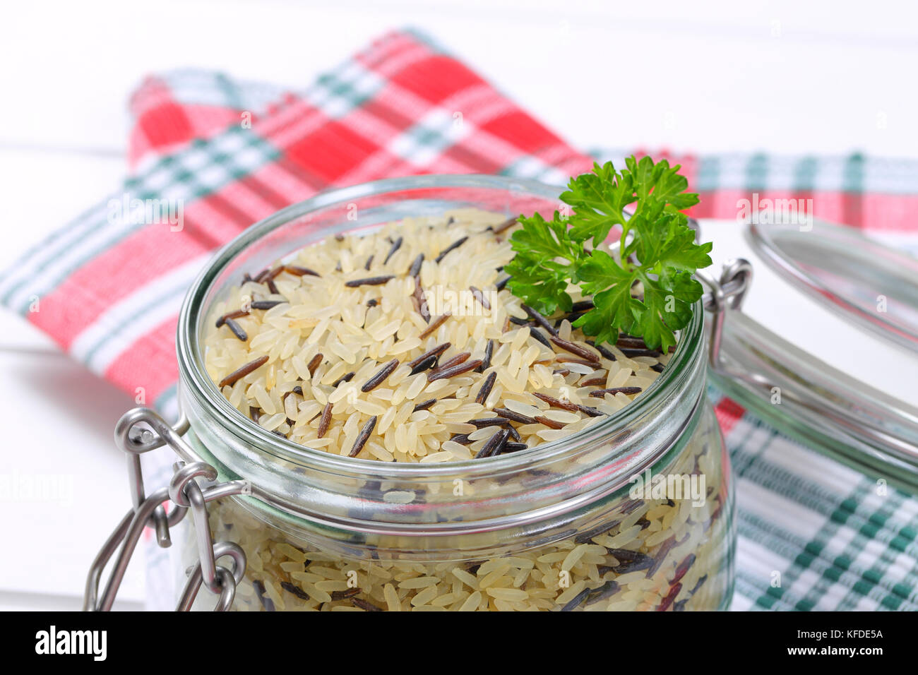 jar of wild rice on checkered place mat - close up Stock Photo - Alamy