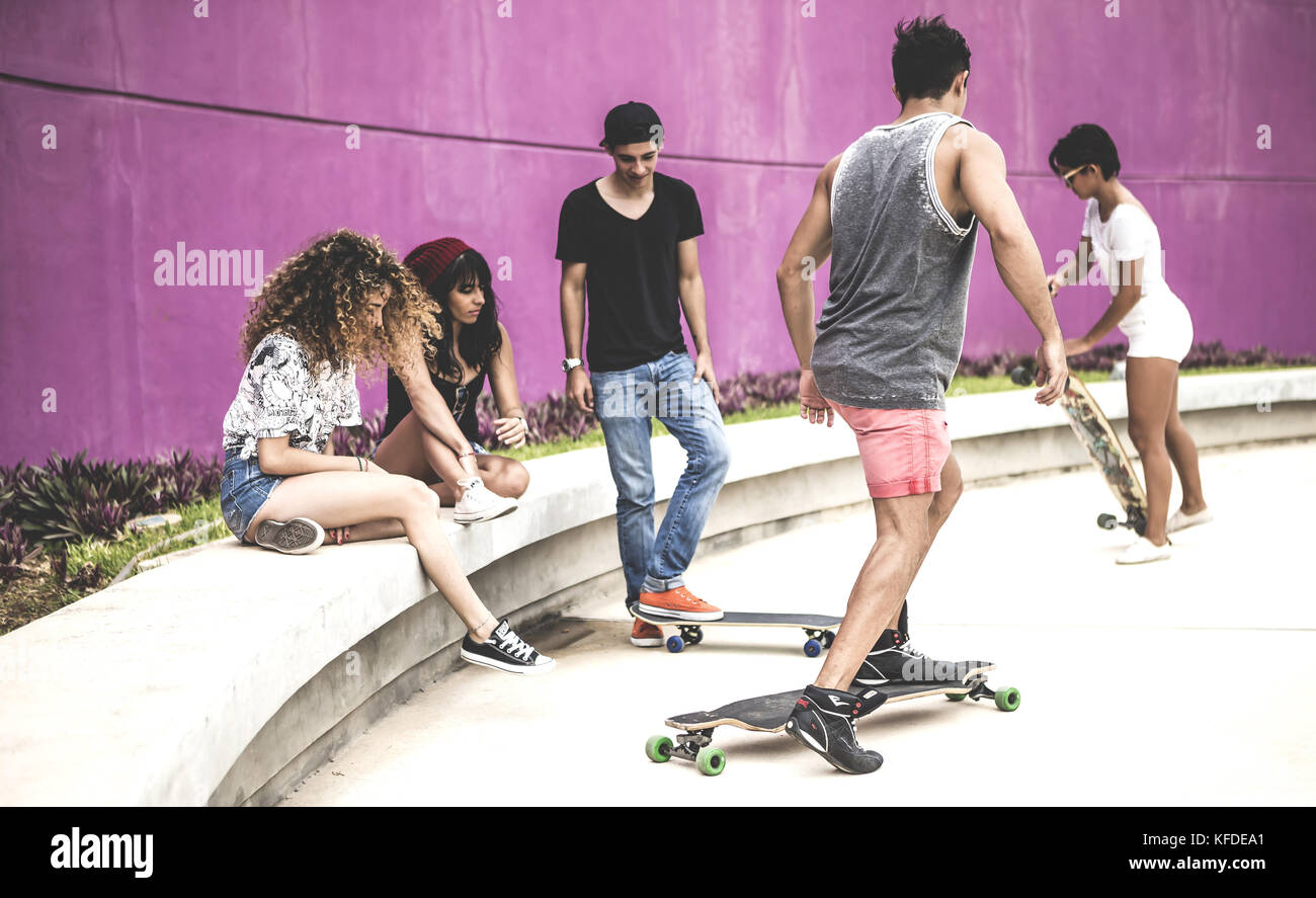 A group of young skateboarders in a skate park Stock Photo - Alamy