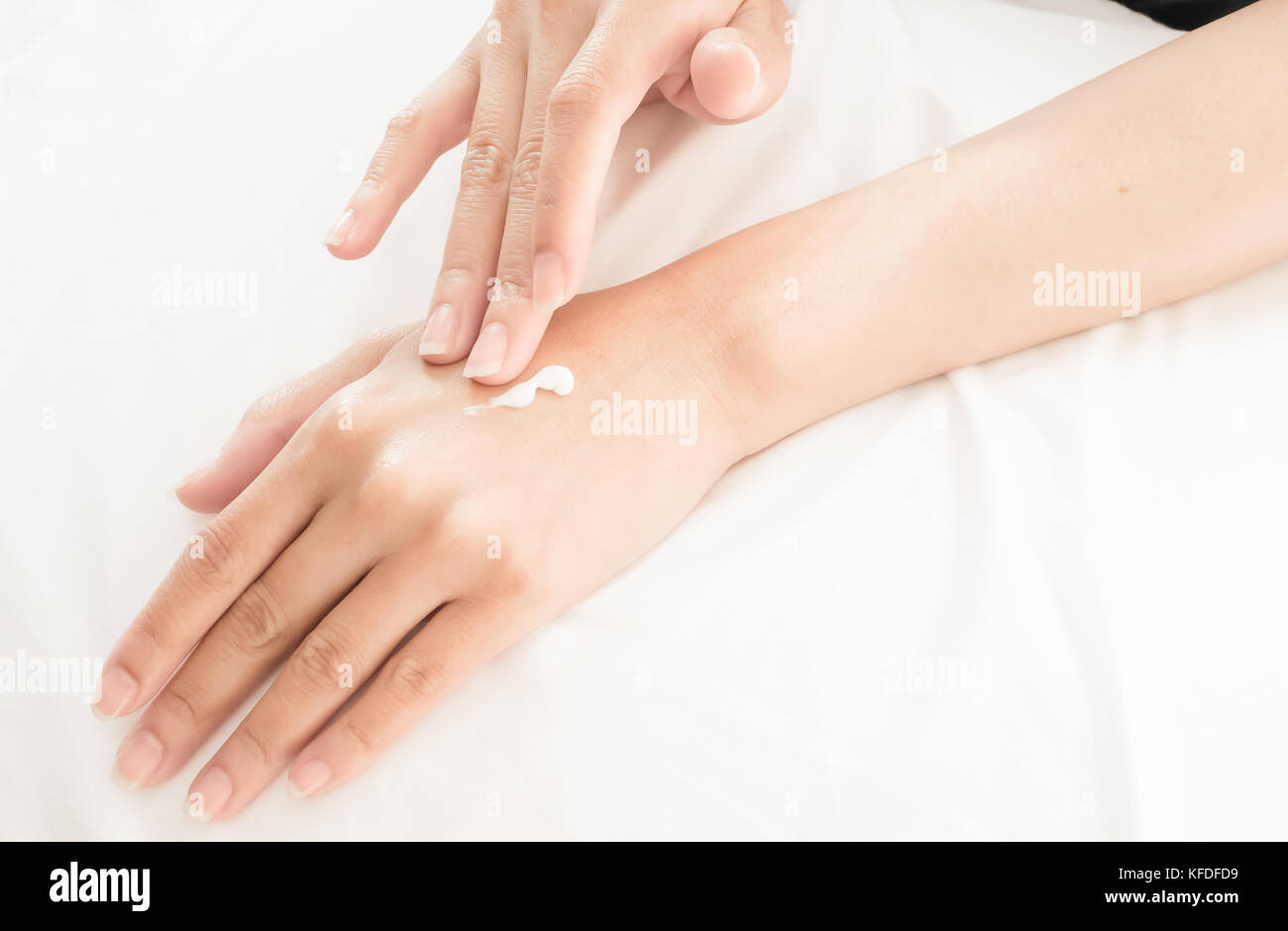 Woman Applying Lotion Arm High Resolution Stock Photography and Images ...
