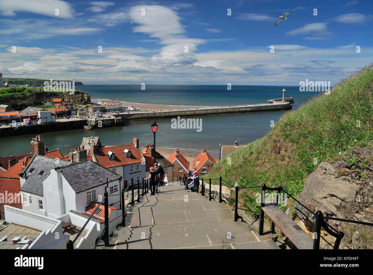 View of the entrance to Whitby harbour from the 199 steps up to the ...