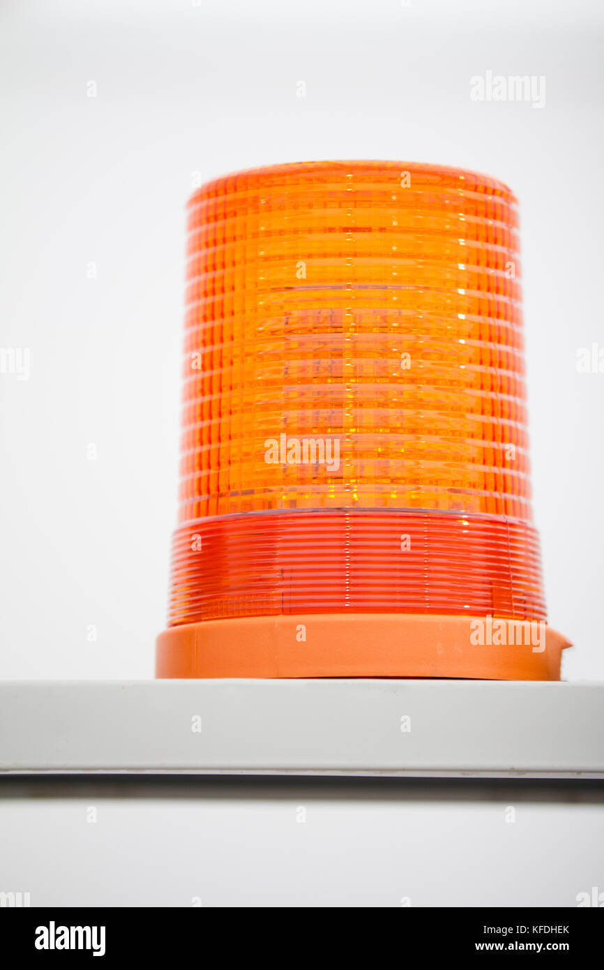 Orange flasher stand alone in exhibition Stock Photo - Alamy