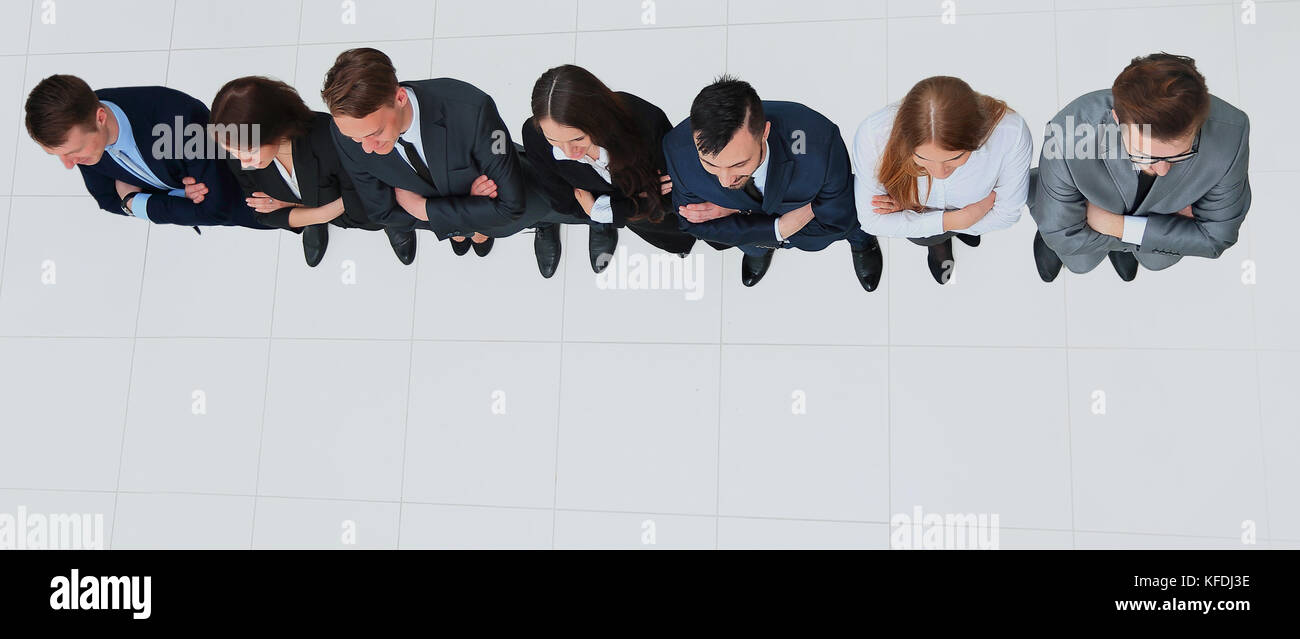 Business people standing in a row. top view Stock Photo - Alamy