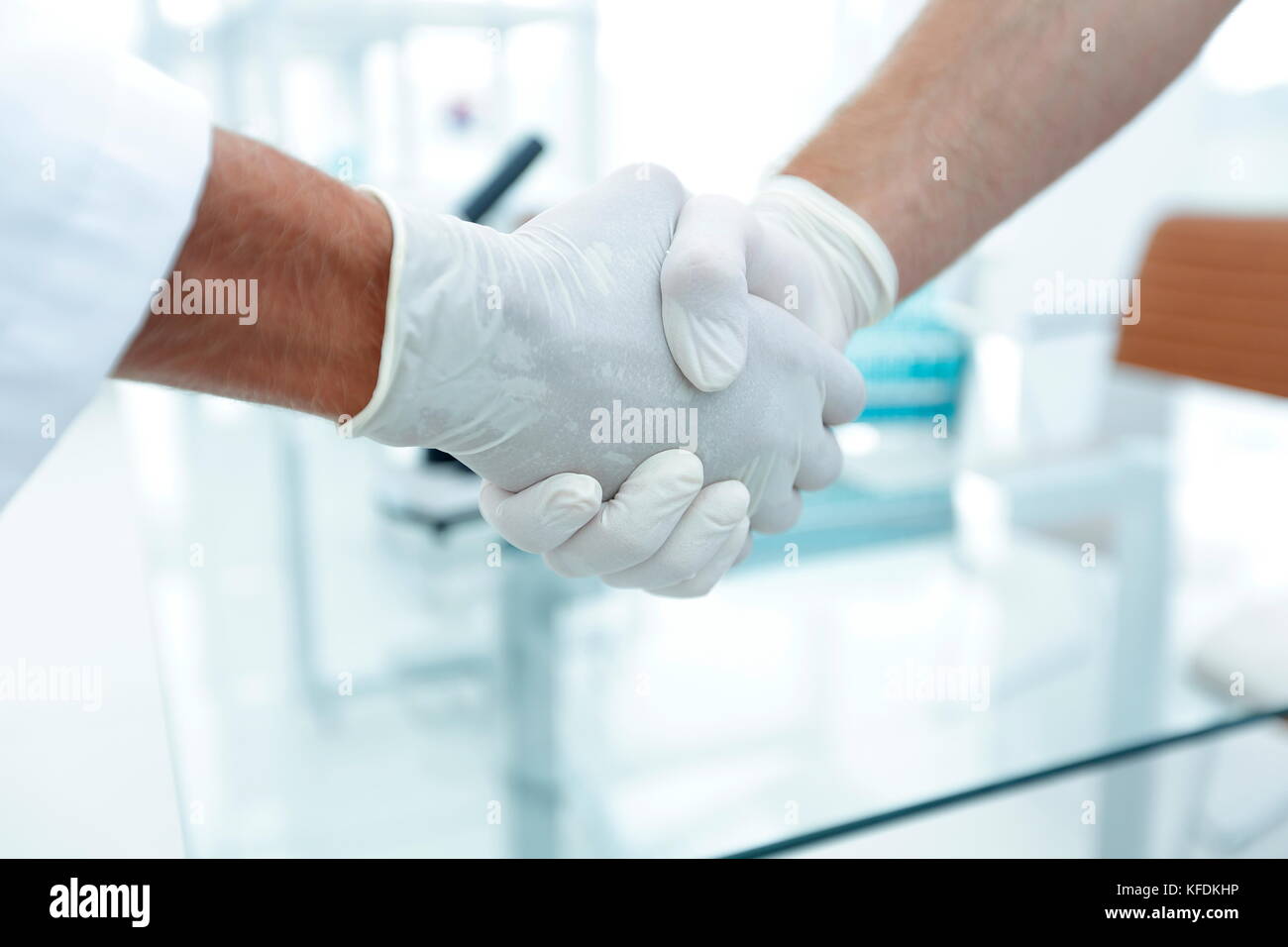 handshake of doctor in laboratory Stock Photo - Alamy