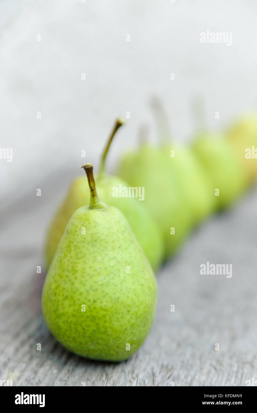 Green pears in row hi-res stock photography and images - Alamy