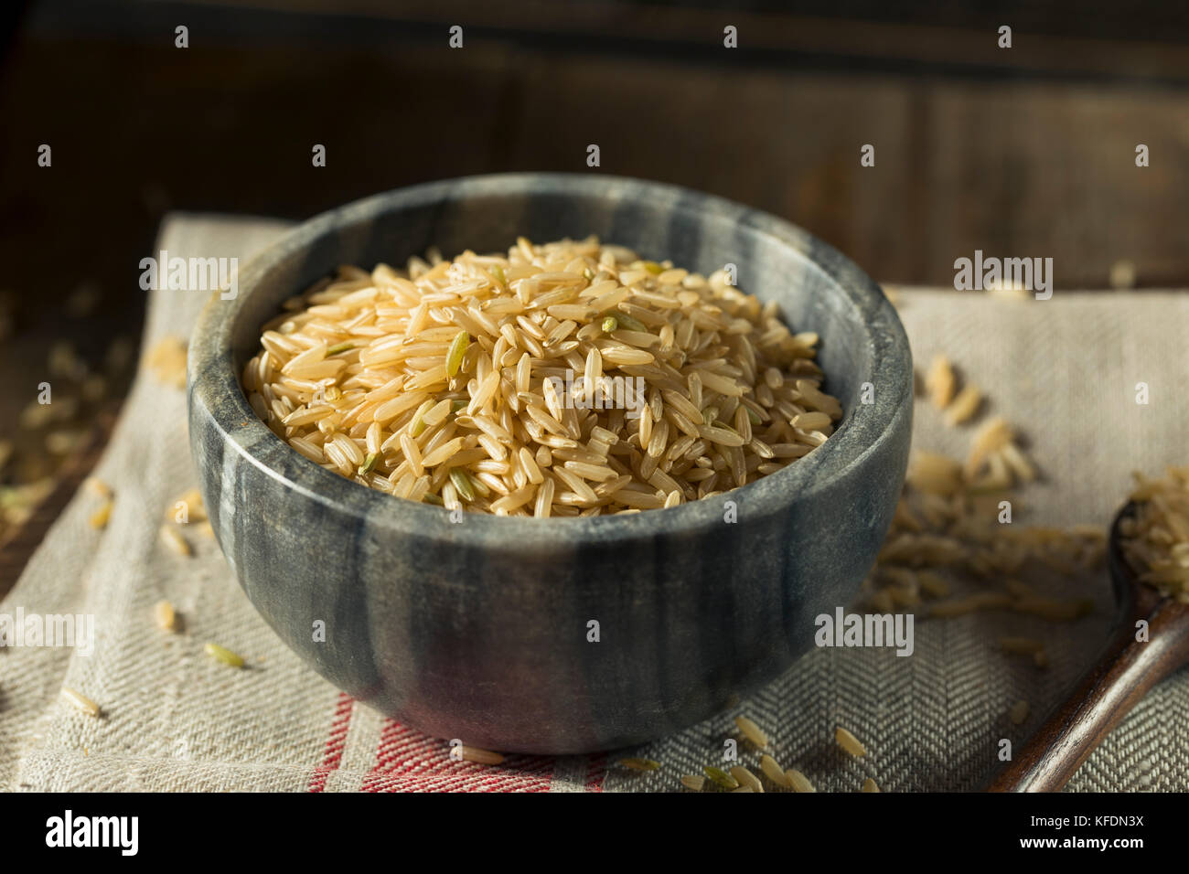 Dry Organic Wild Long Brown Rice in a Bowl Stock Photo - Alamy