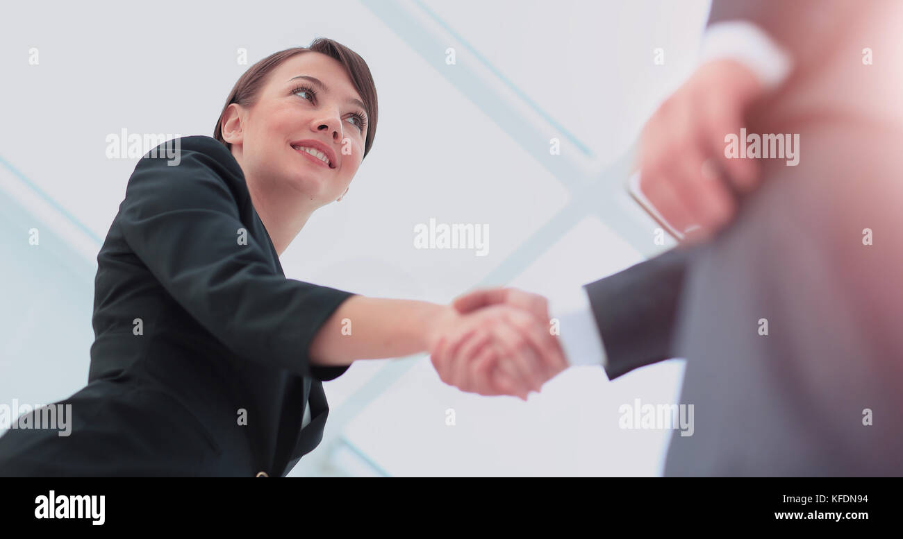 Two professional business people shaking hands Stock Photo - Alamy