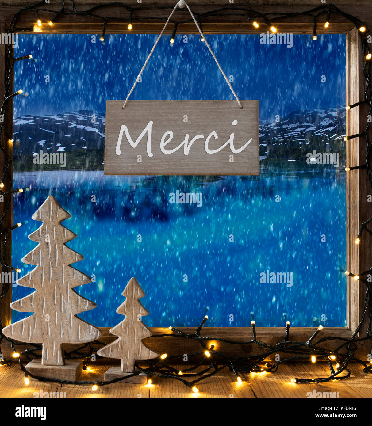 Sign With French Text Merci Means Thank You. Window Frame With Winter ...