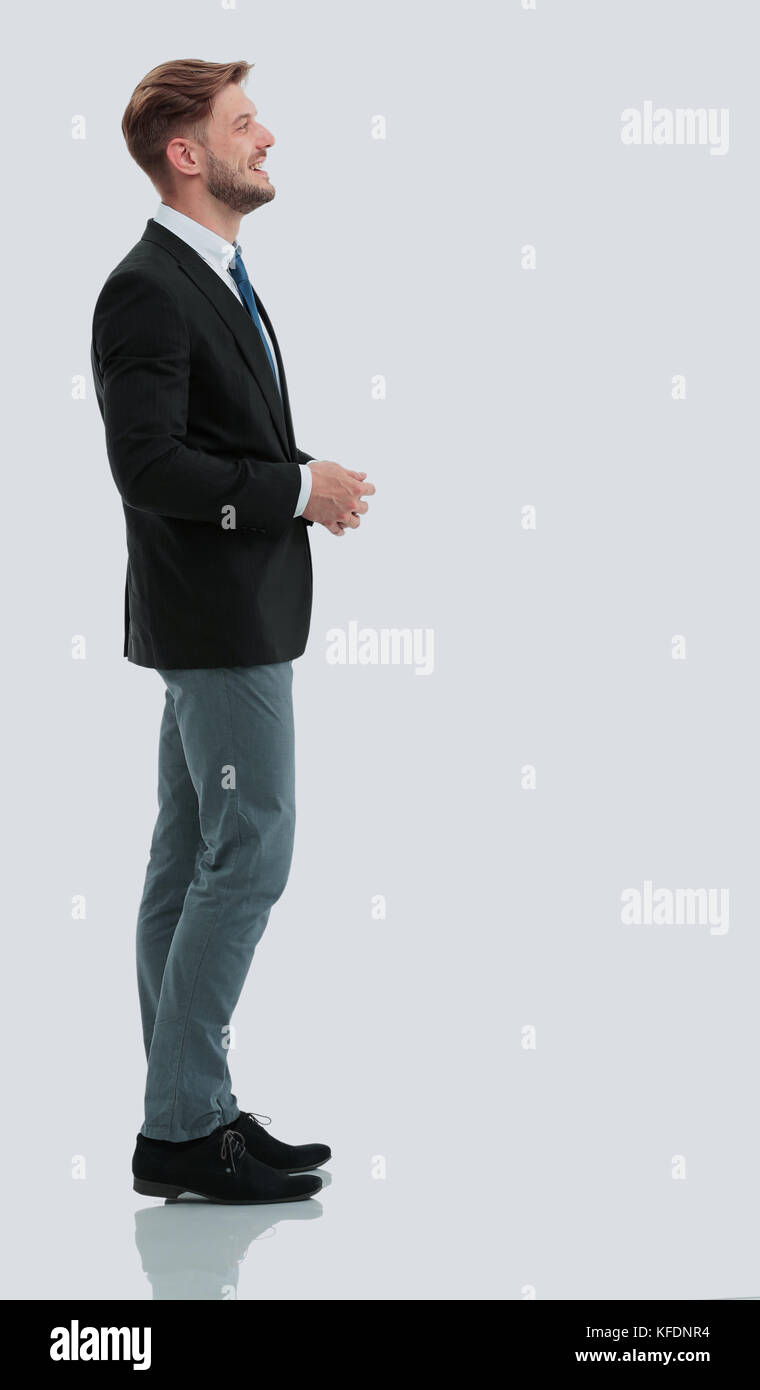 Portrait of the young smiling turned businessman isolated on a white ...