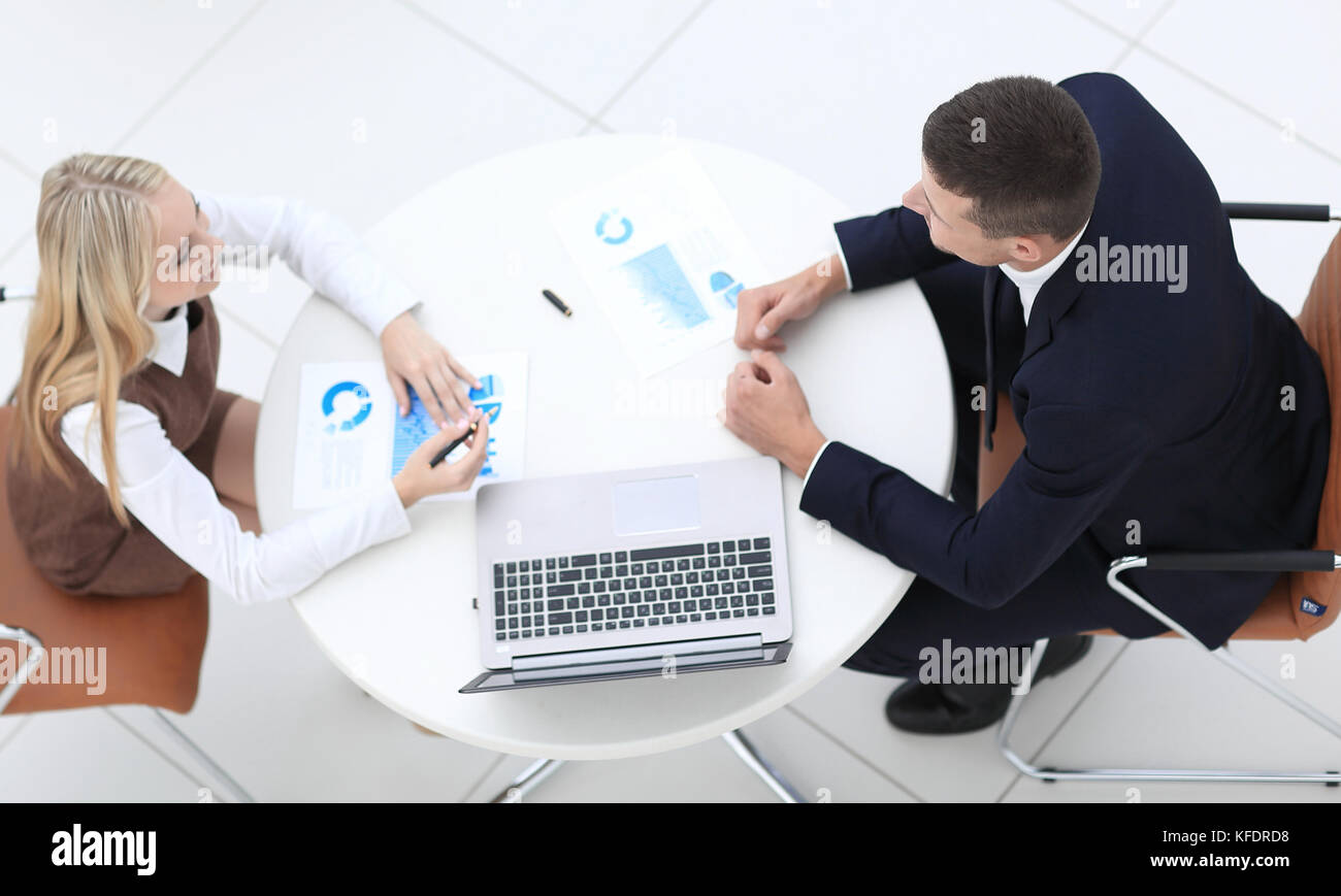 Two people sitting round table hi-res stock photography and images - Alamy