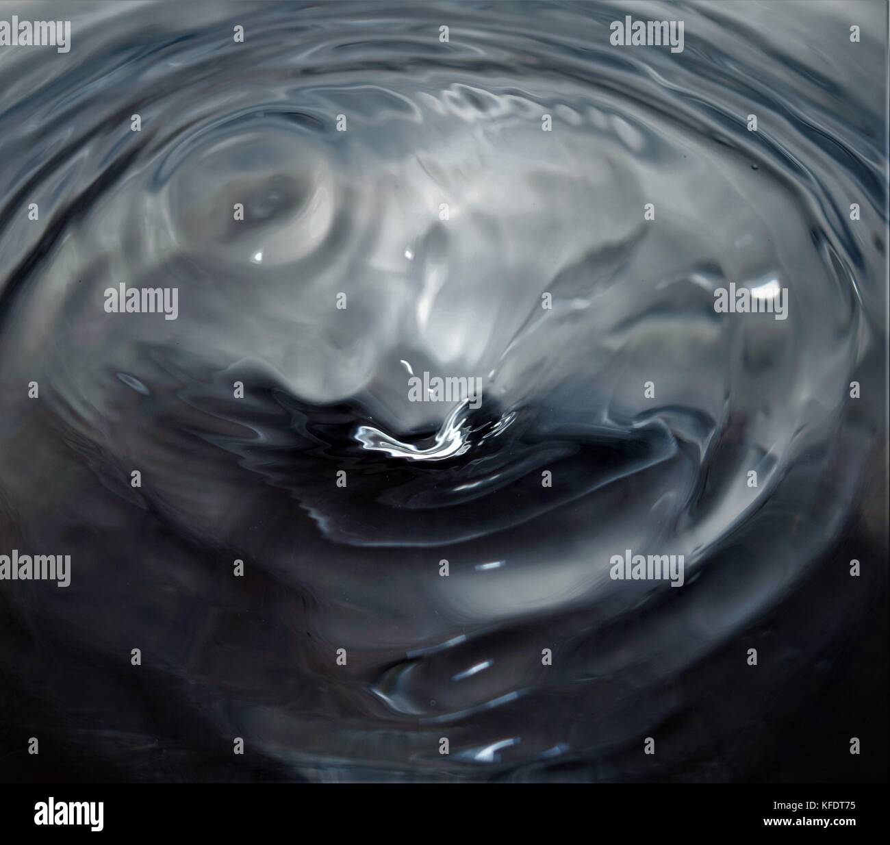 Droplets and ripples of various shapes and colours Stock Photo - Alamy