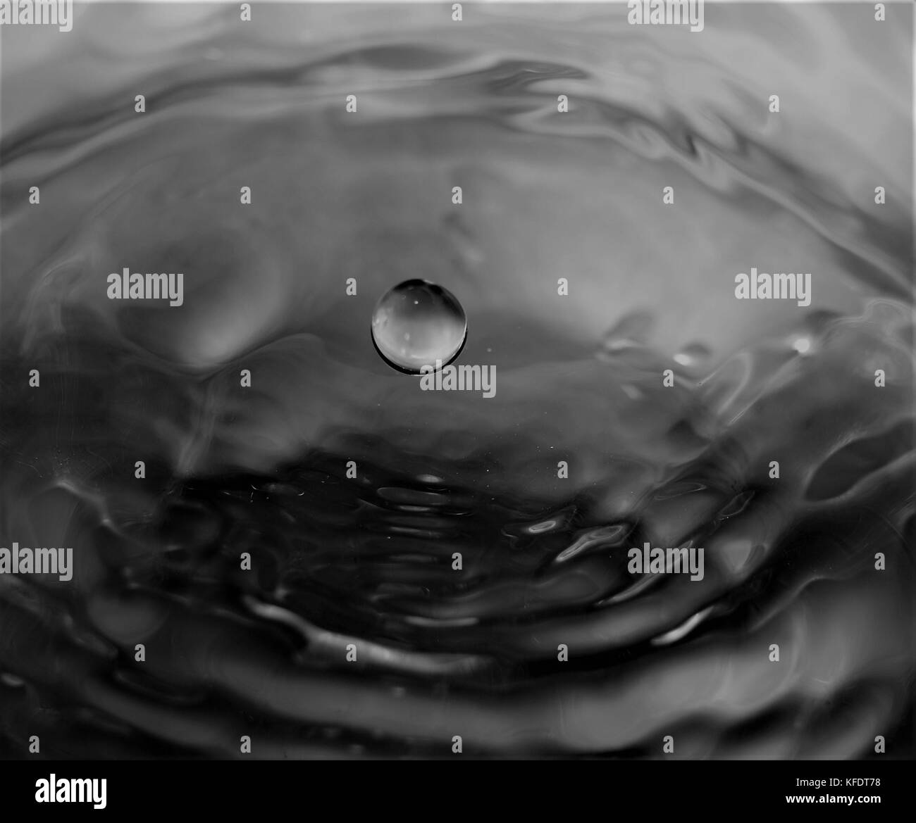 Droplets and ripples of various shapes and colours Stock Photo - Alamy