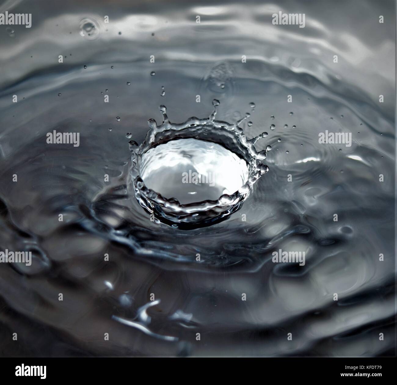 Droplets and ripples of various shapes and colours Stock Photo - Alamy