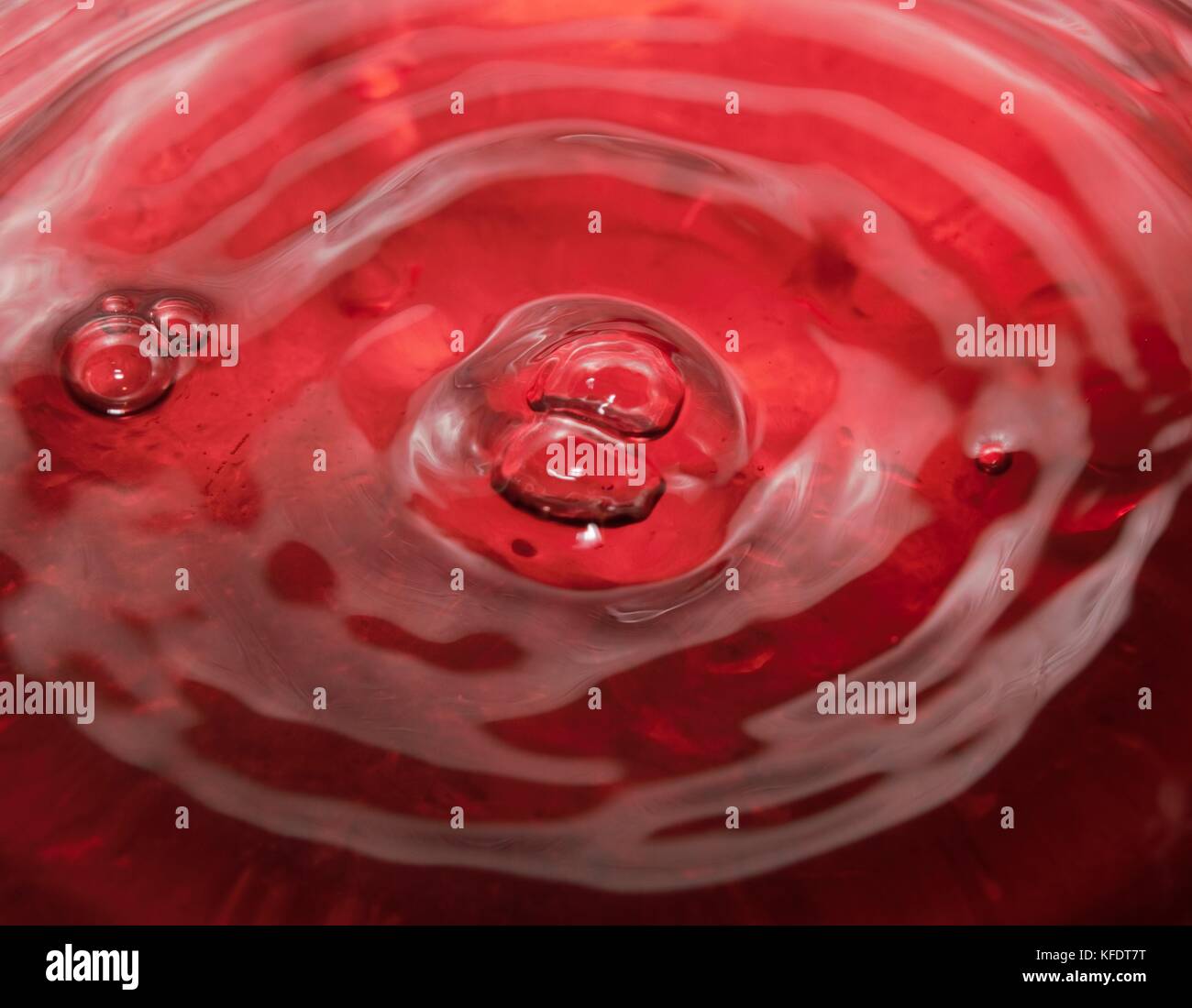 Droplets and ripples of various shapes and colours Stock Photo - Alamy