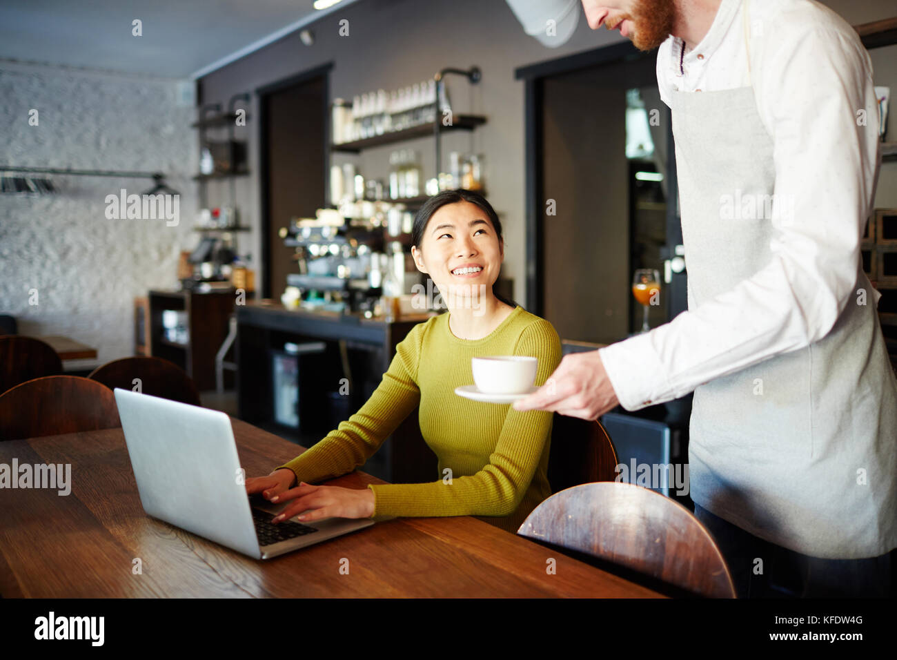 Young waiter busy cafe hi-res stock photography and images - Alamy