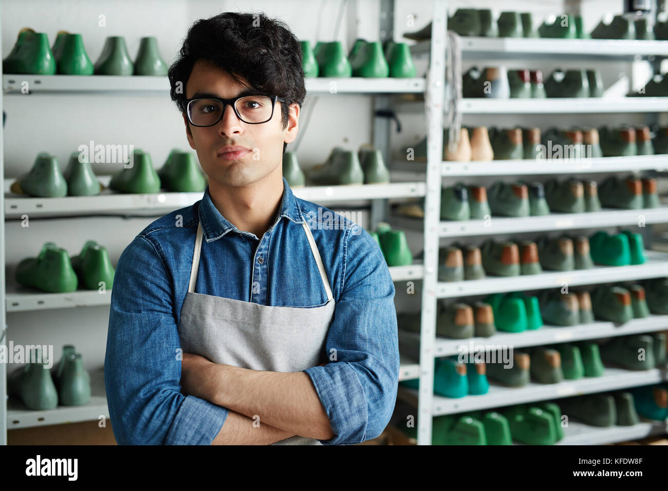 Contemporary self-employed shoemaker in his workshop Stock Photo - Alamy