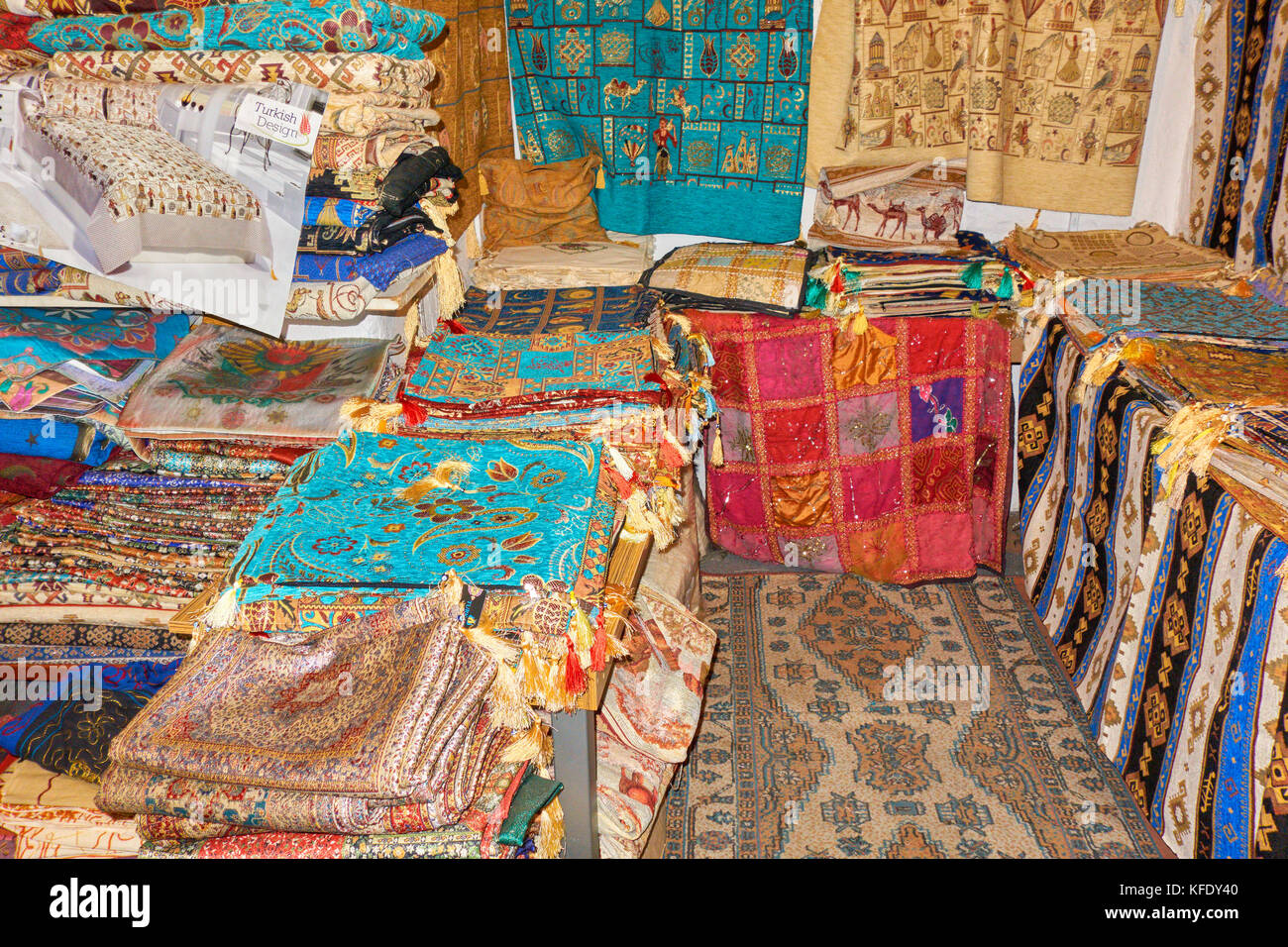 Stacks of colorful handmade pure wool rugs in tourist stall of Old ...