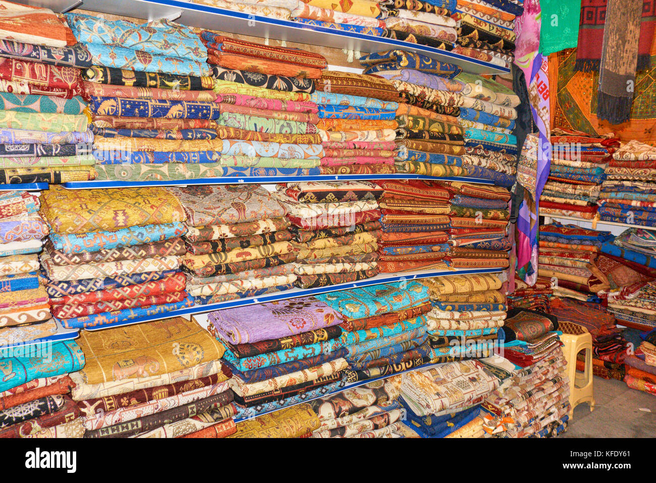 Stacks of colorful handmade pure wool rugs in tourist stall of Old ...