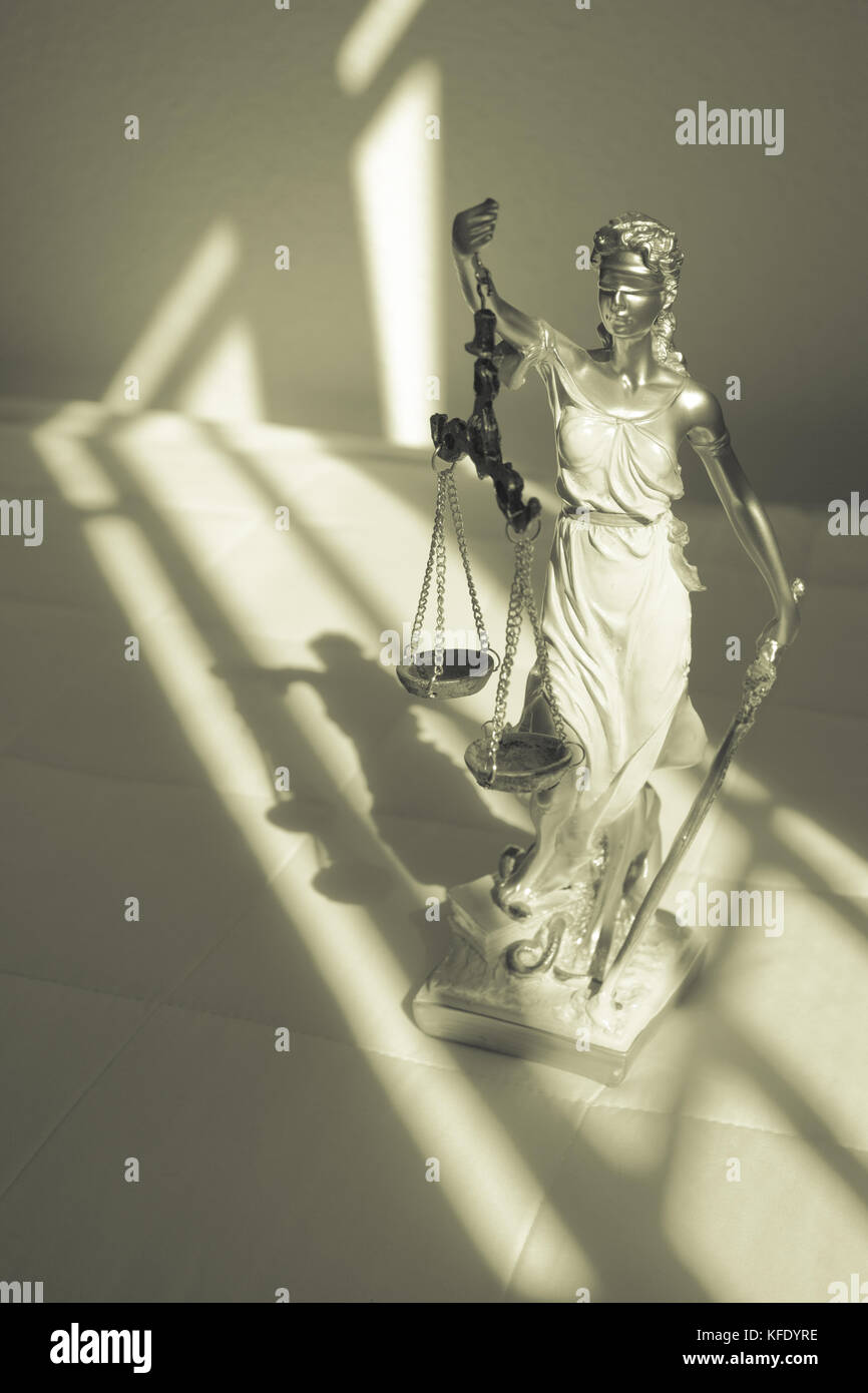 White female statue symbol of justice Themis. This figure has not ...