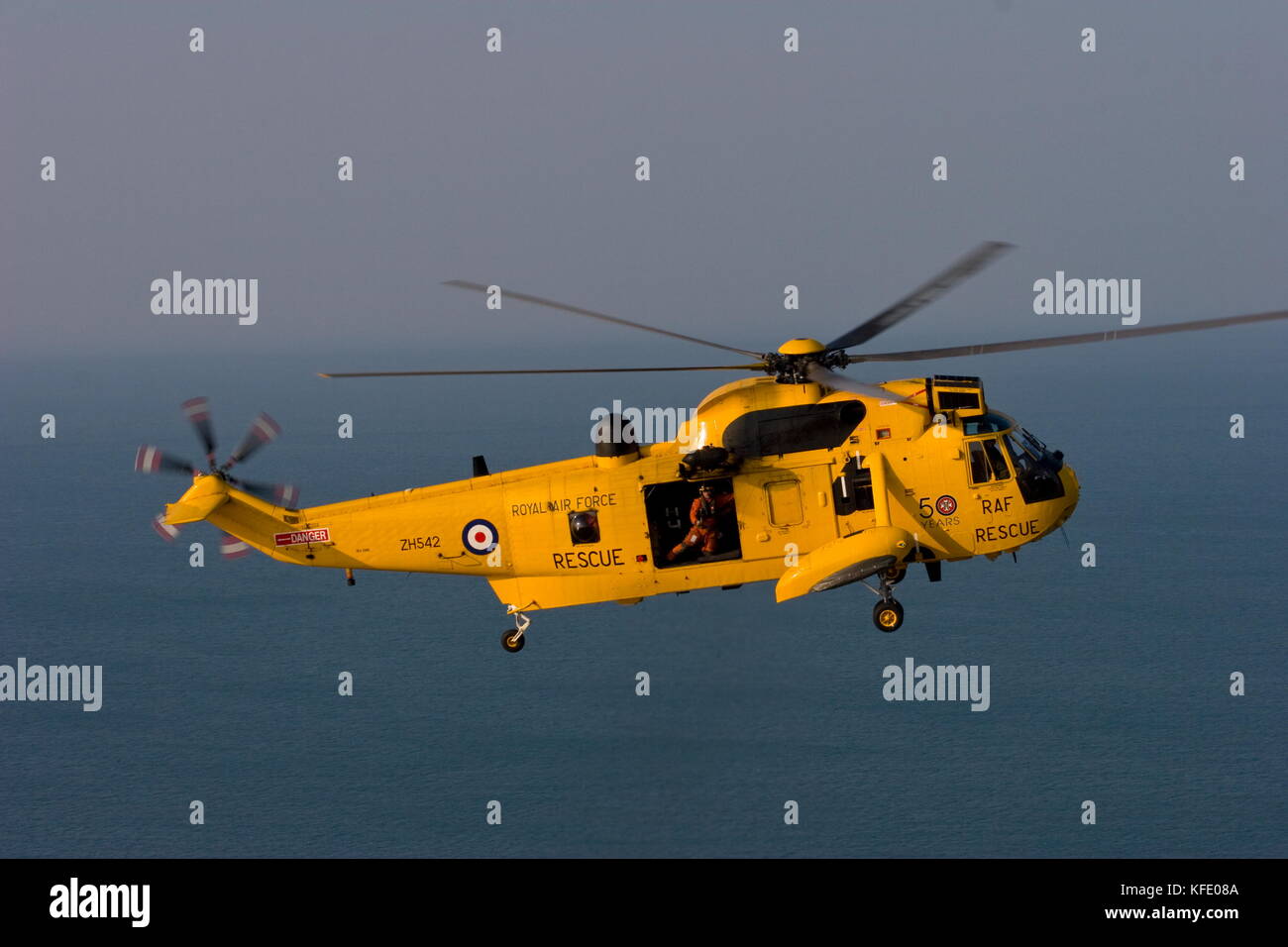 Sea King Helicopter with crew in open doorway on an air sea rescue ...