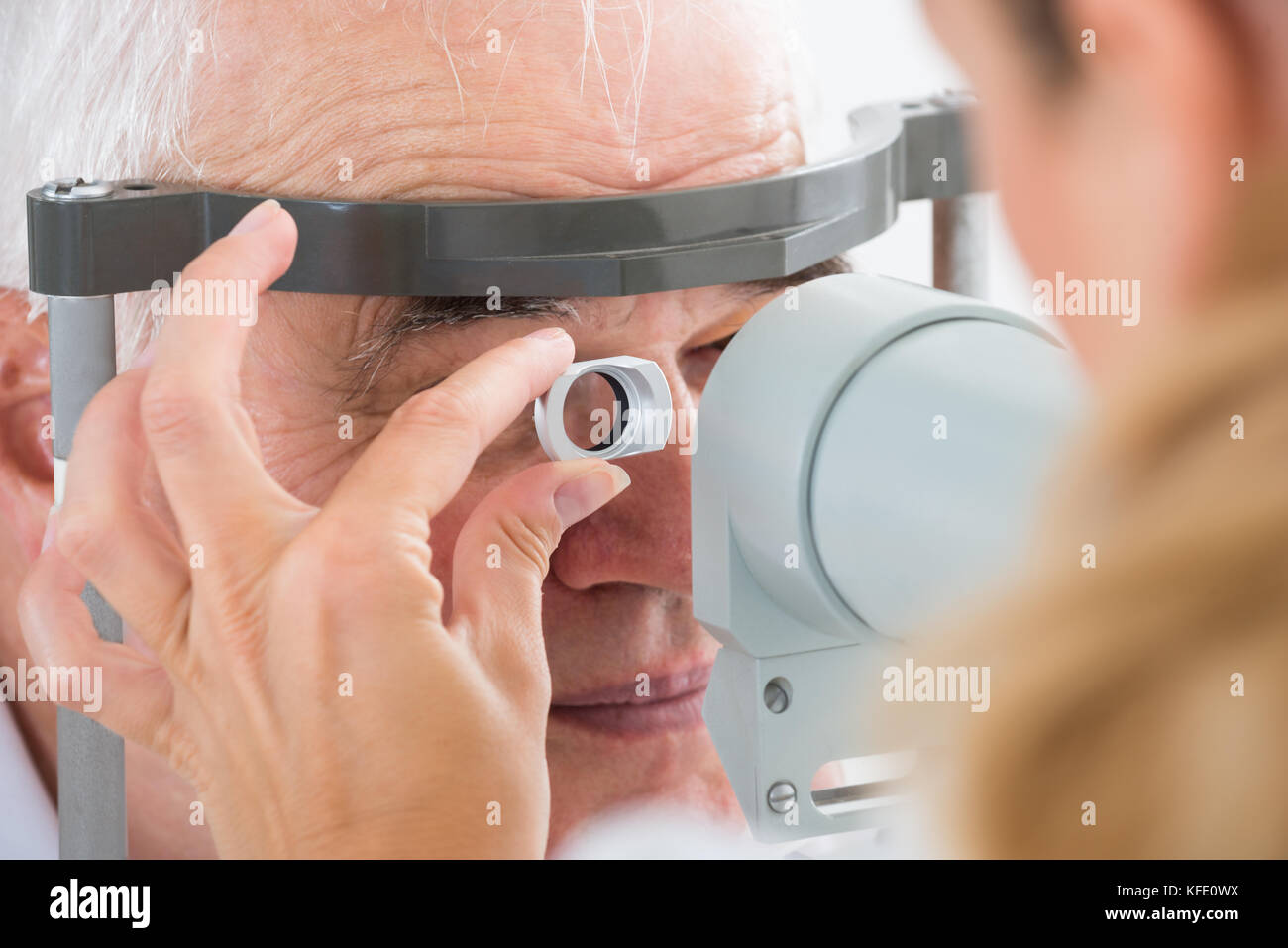 Old man eye test hi-res stock photography and images - Alamy