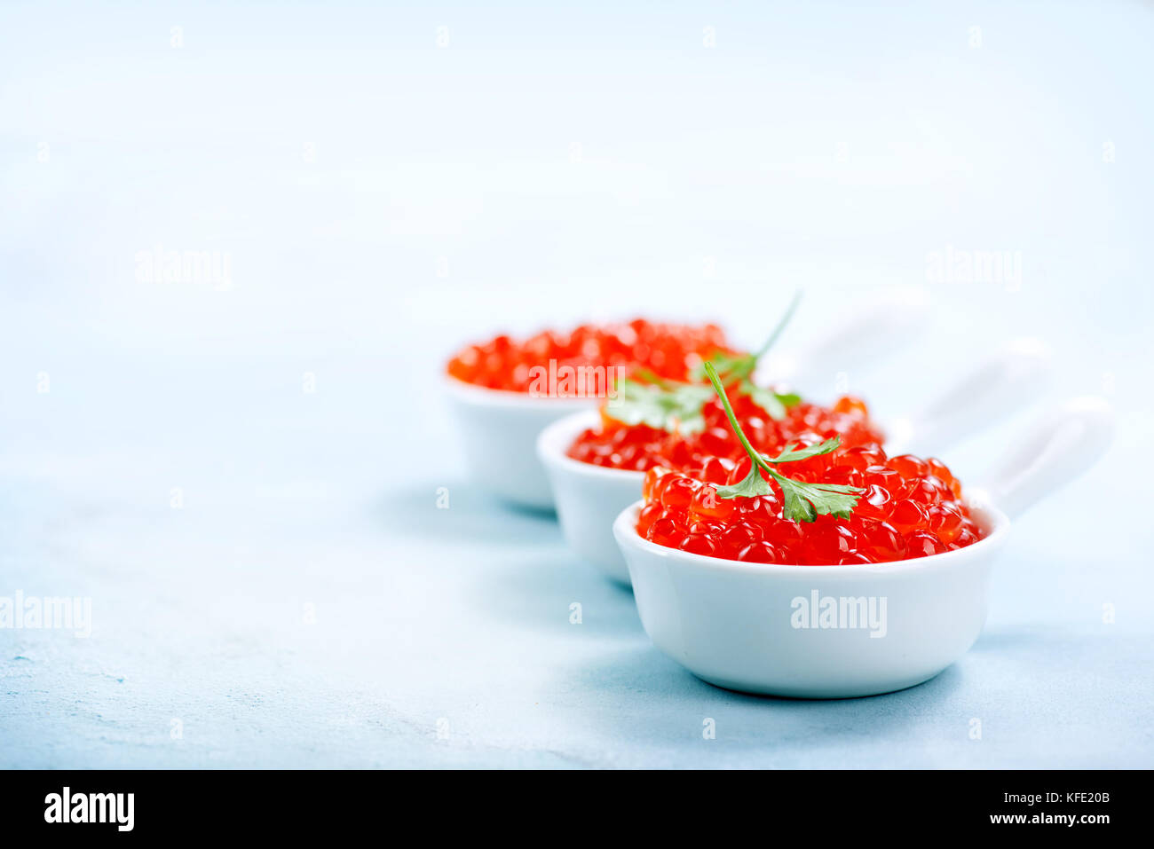 red salmon caviar in bowls and on a table Stock Photo - Alamy