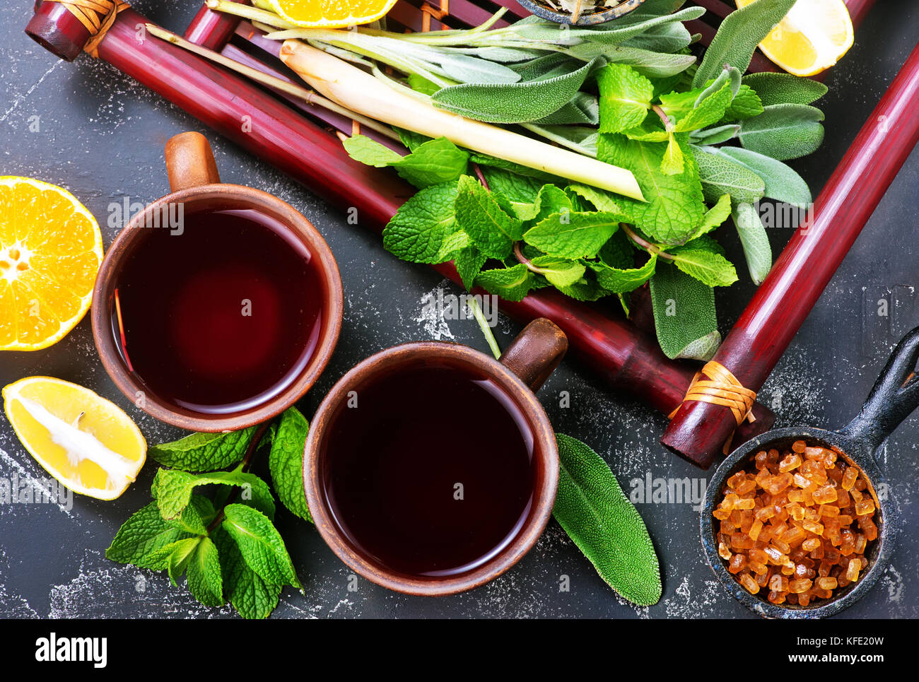 fresh tea in cups and on a table Stock Photo - Alamy