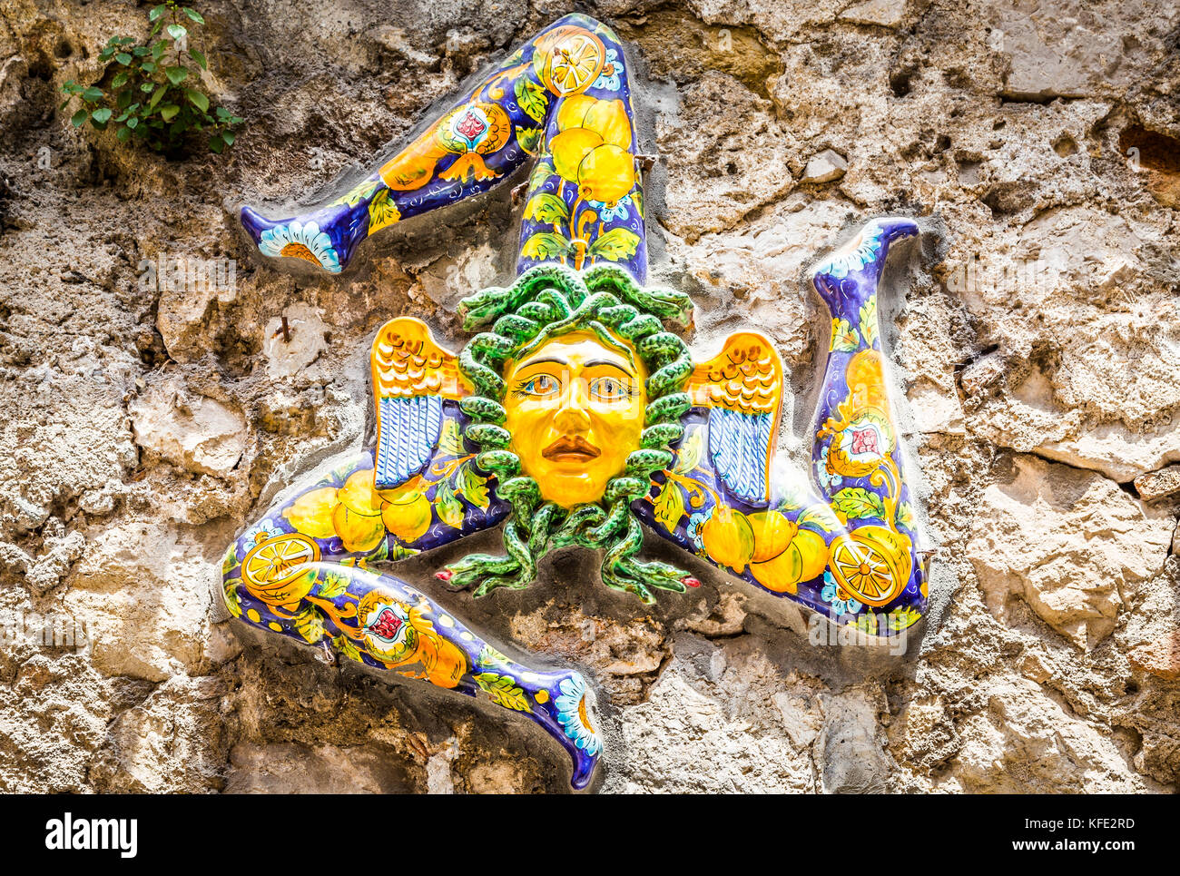 A typical ceramic Trinacria, the symbol of Sicily, hung along the ...