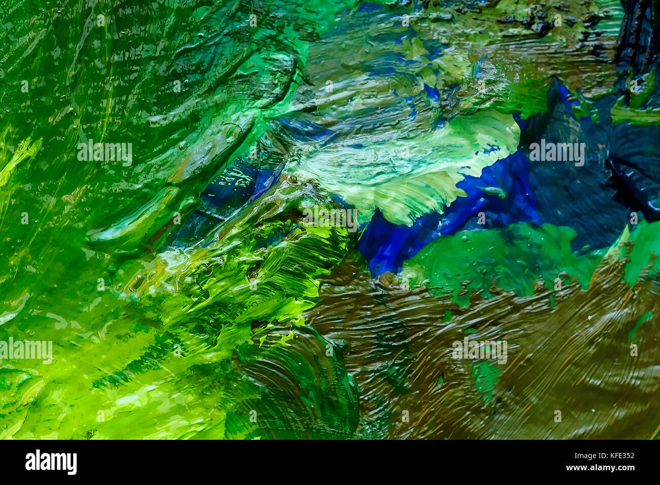 Detail of artist palette, color tones mixed together Stock Photo - Alamy