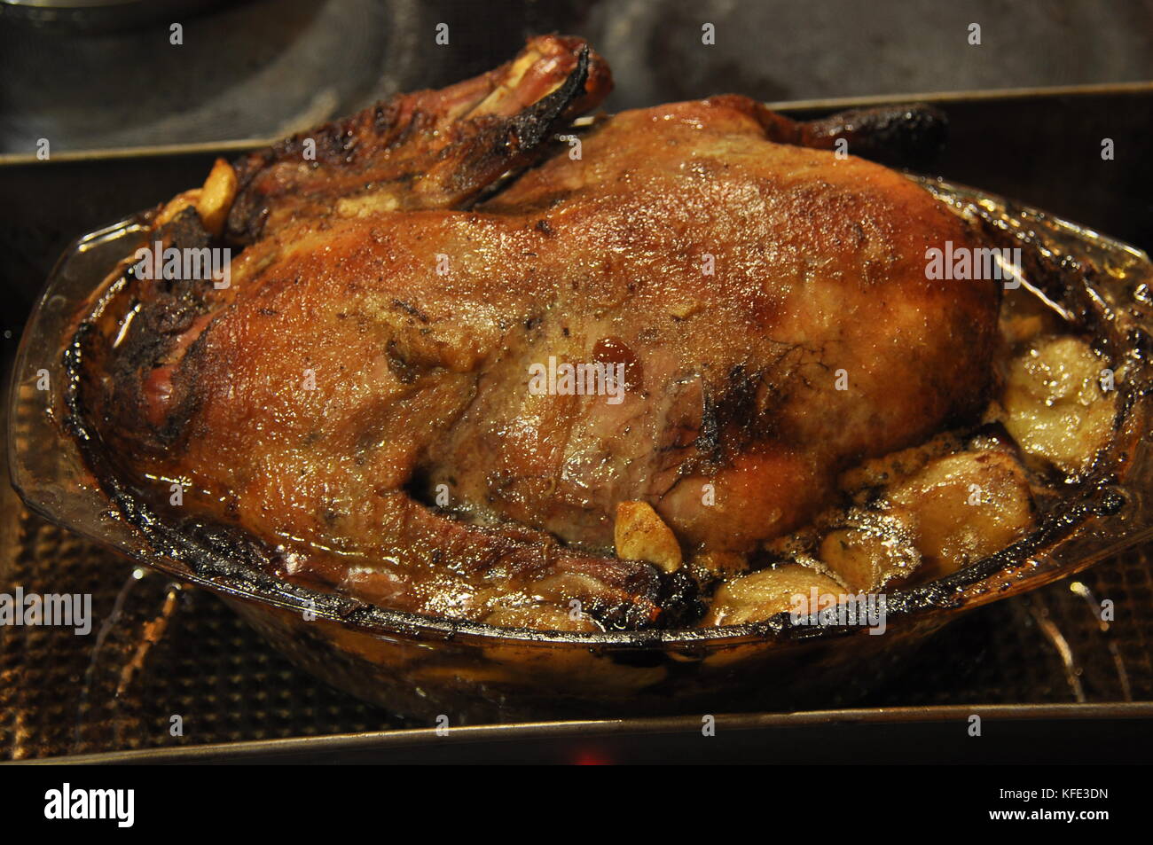 Duck with apples and cranberries. Poultry baked in casserole Stock ...