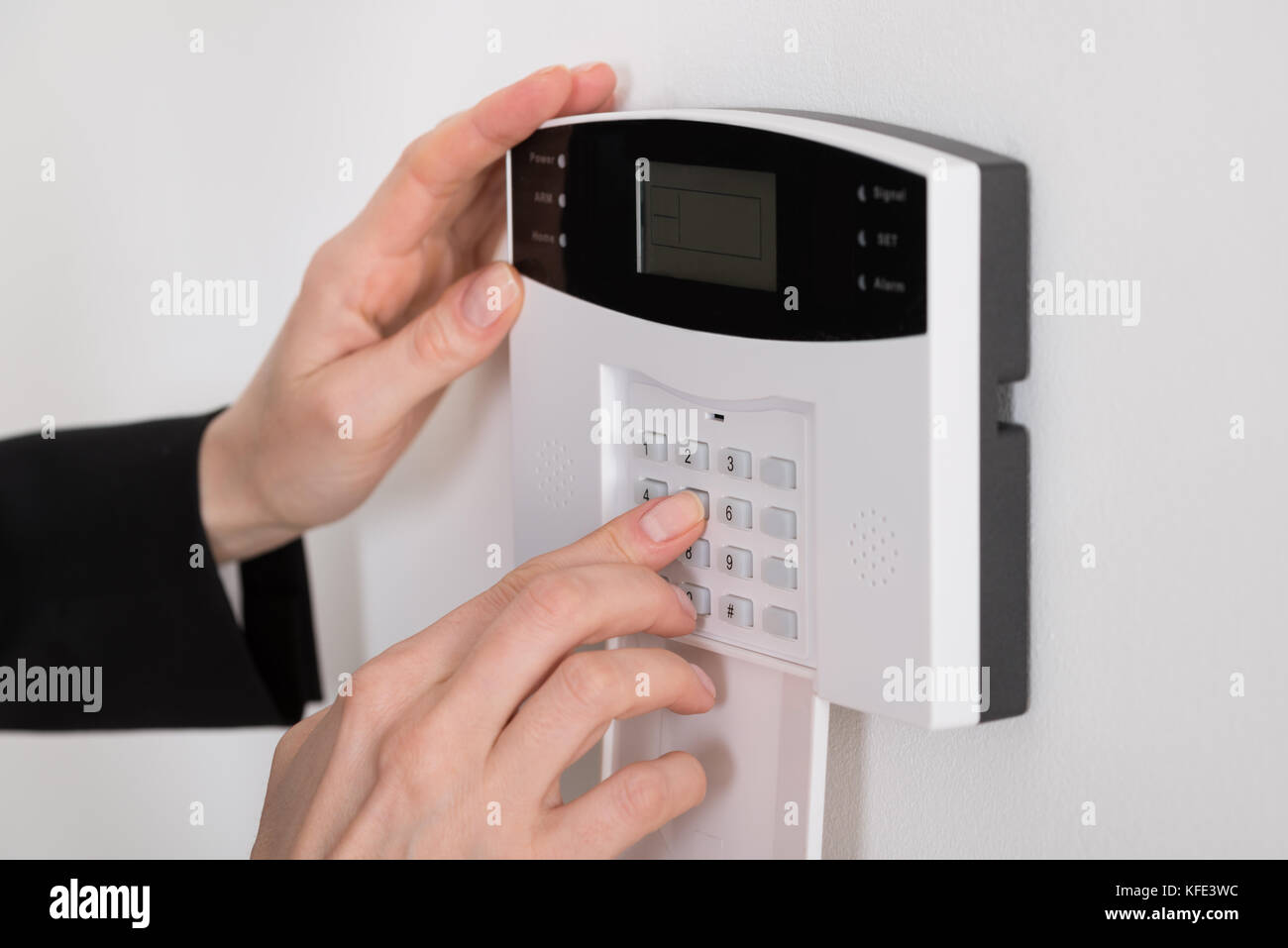 Entering a code hi-res stock photography and images - Alamy