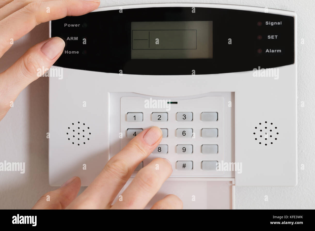 Close-up Of A Woman Hand Entering Code In Security System Stock Photo ...