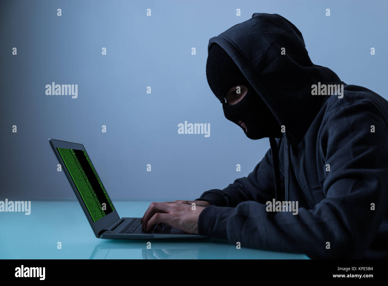 Hacker Stealing Information From Laptop In Office At Night Stock Photo ...
