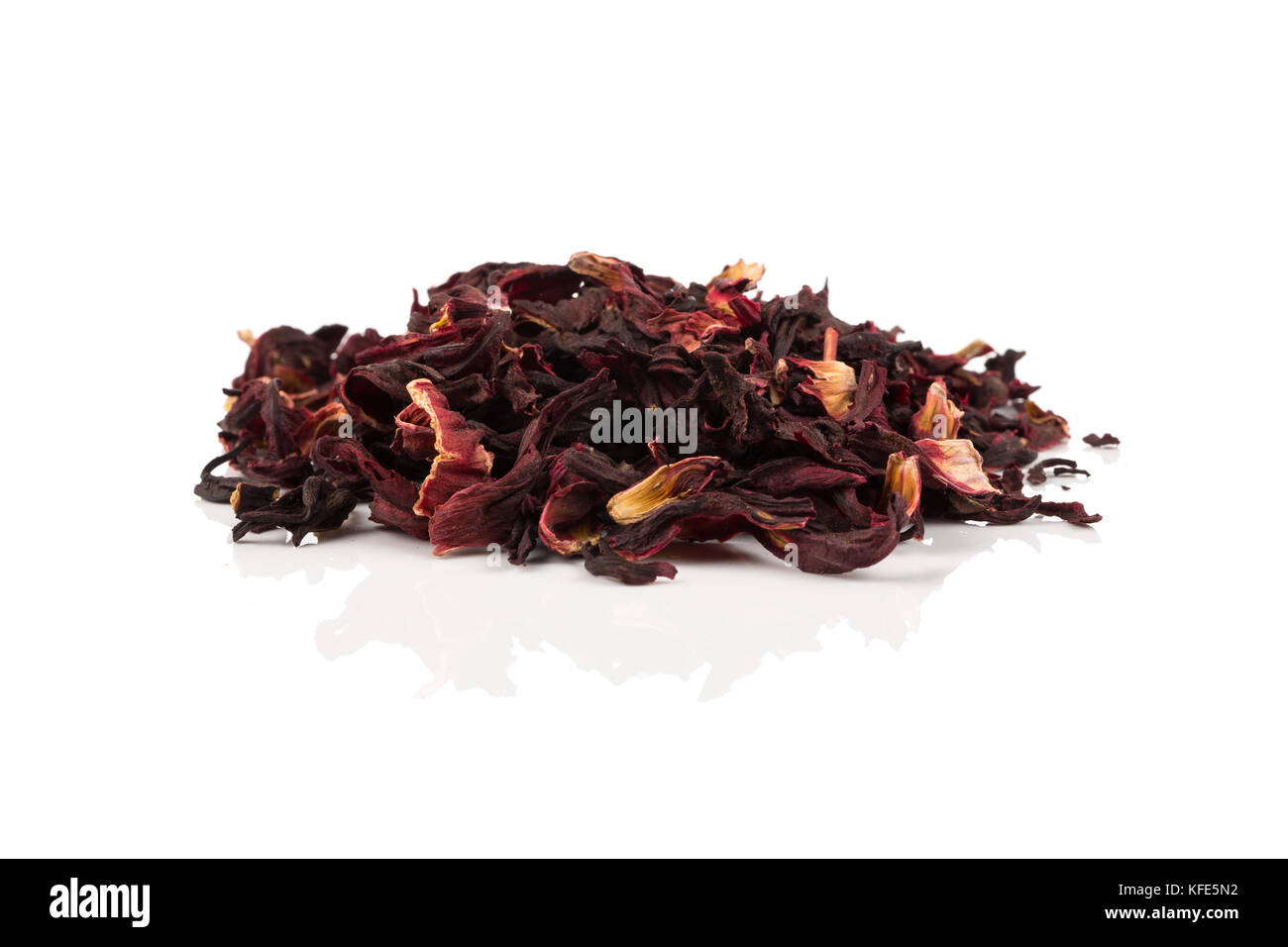 Heap of aromatic Hibiscus tea (karkade), isolated on white background ...